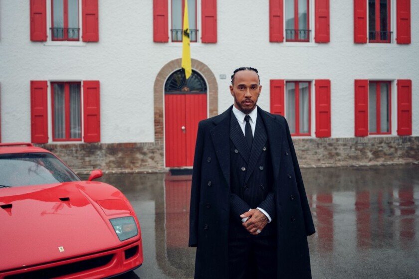 Lewis Hamilton poses with a Ferrari F40 on his first day at work - The ...