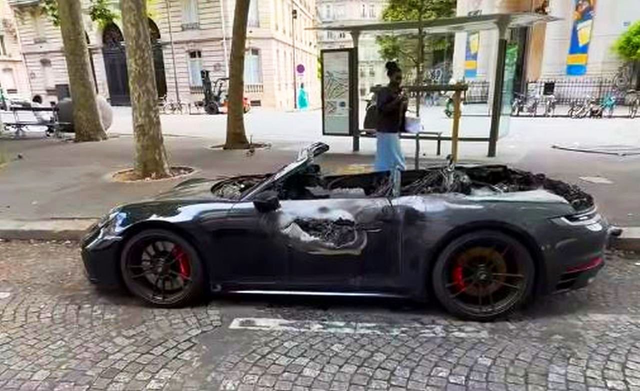 Porsche 911 set on fire during Paris riots after Champions League final ...